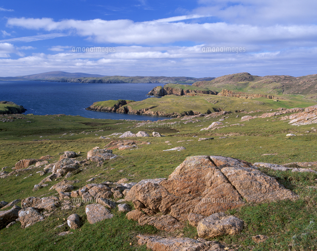 West coast of Muckle Roe, spectacular coastal scenery of red granite ...