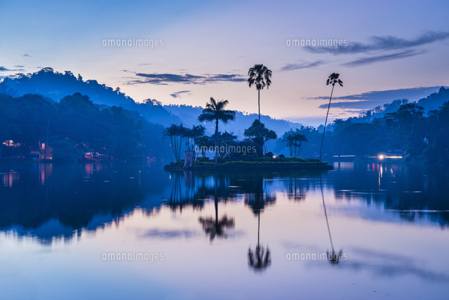 Kandy Lake and the island which houses the Royal Summer House at dawn ...