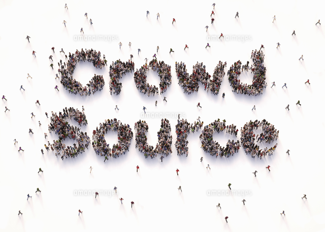 Overhead view of people forming words "crowd source"[20039010620]の写真素材 ...