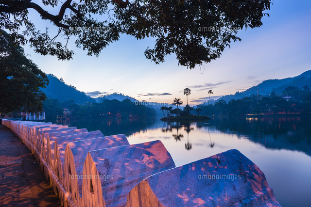 Kandy Lake and the island which houses the Royal Summer House at dawn ...