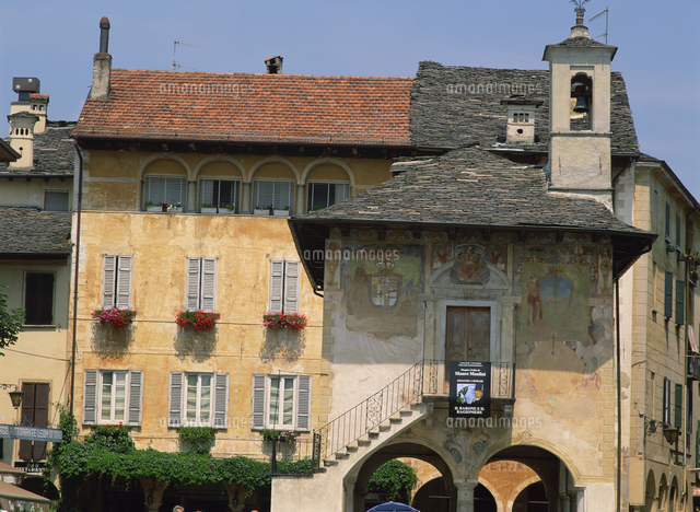 Painted walls on a building in the town of Orta on Lake Orta, Piedmont ...