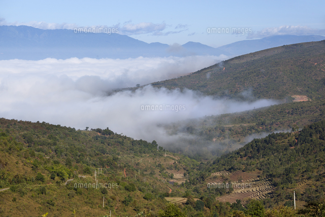 Morning fog over Kengtung and Shan hills on road to Loimwe, near ...