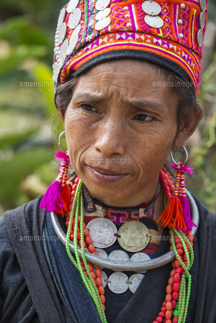 Laos, Pak Namnoy, Oudomxay Province. The decorated headdress of a woman ...