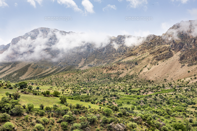 Iran, Margoon. A fertile valley with low clouds in the Abshare Margoon ...