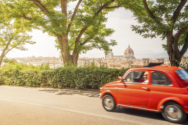 Original old red Fiat Cinquecento (500) with Florence Cathedral in ...