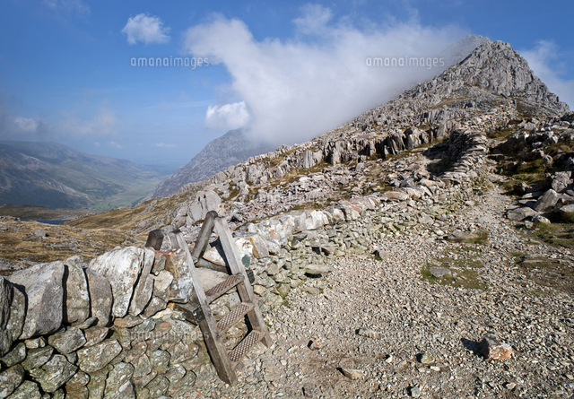 Peak of Tryfan with Nant Ffrancon valley in the distance viewed from ...