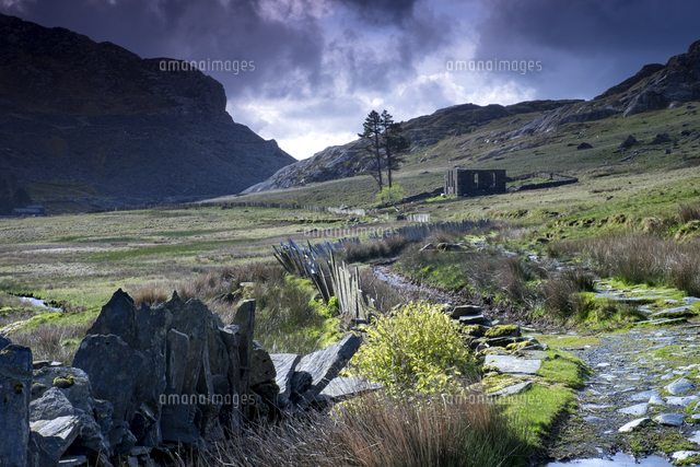A traditional Welsh slate fence leads to abandoned Rhosydd Chapel along ...