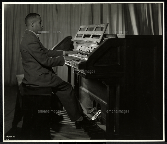 African American man playing the organ at the New York Assoc ...