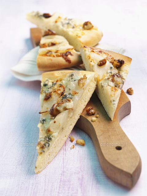 Triangles of bread topped with melted cheese and nuts[22199077796]の写真素材 ...