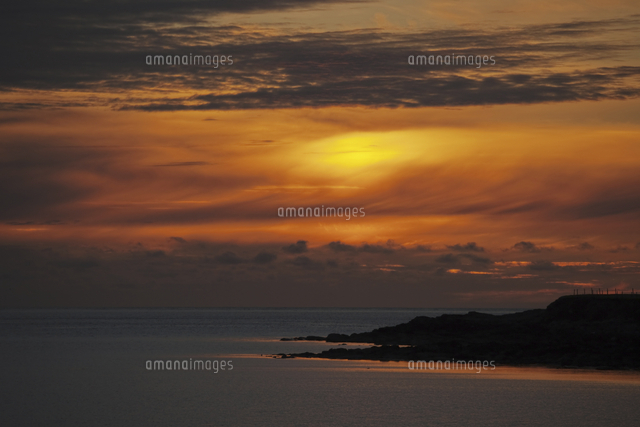 View of coastline at sunset, Westing Beach, Unst, Shetland I ...