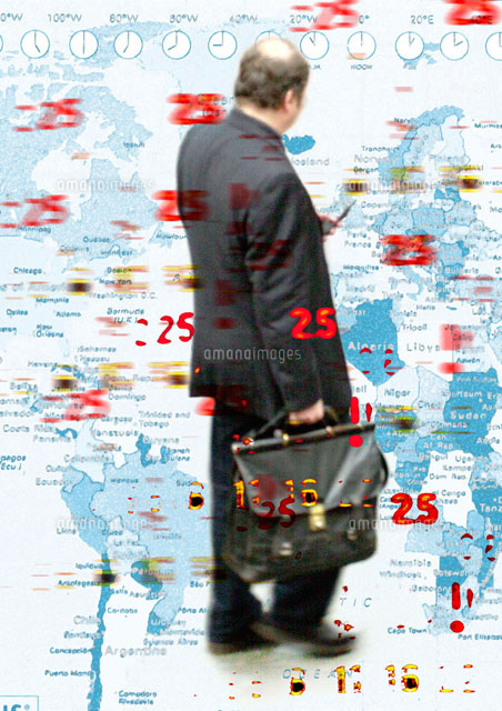 man standing on map of time zones[11001021052]の写真素材・イラスト素材｜アマナイメージズ