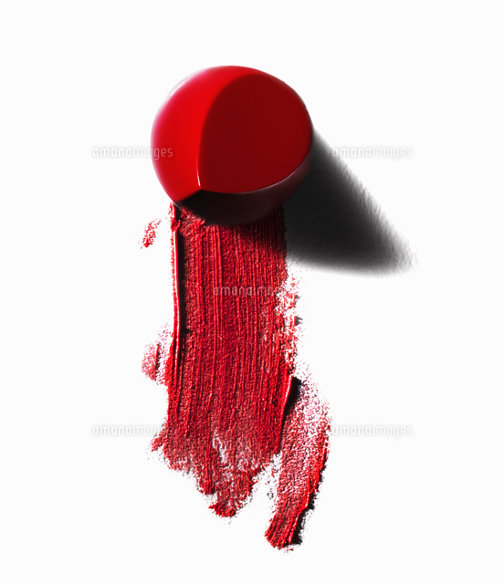 Abstract of piece of red lipstick and smudged line[11015256296]の写真素材 ...