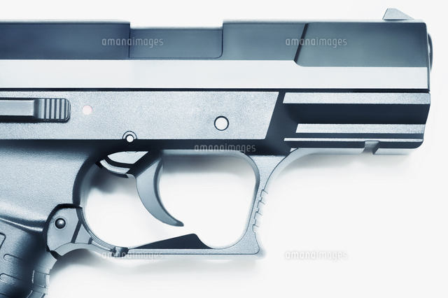 Close-up of trigger and barrel of a handgun[11016027803]の写真素材・イラスト素材 ...