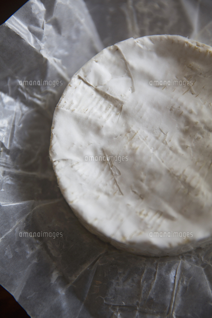 Brie cheese on a piece of paper (seen from above)[11047045800]の写真素材 ...