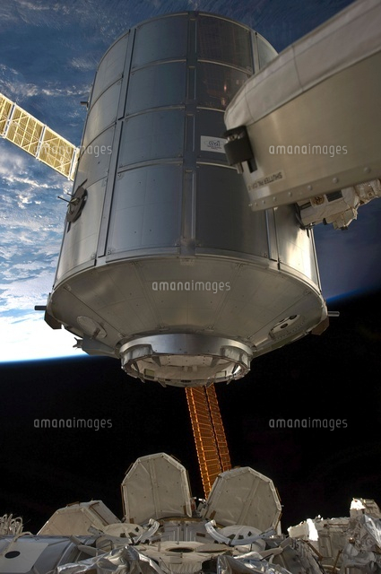 The Permanent Multipurpose Module in the grasp of Canadarm2 ...
