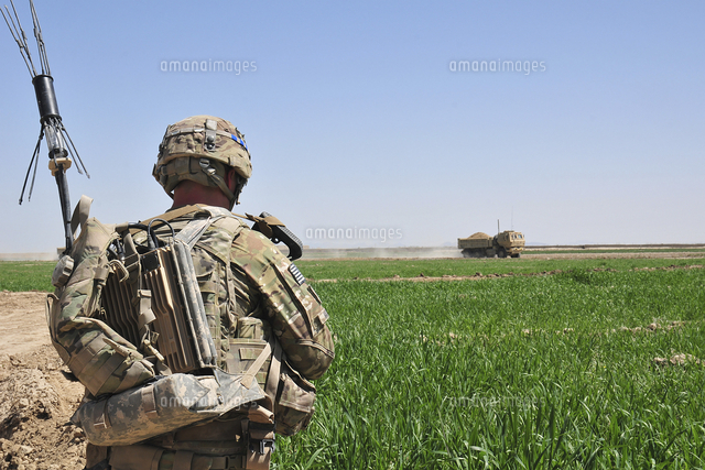 A U.S. Soldier provides security during a road construction[11079020247 ...