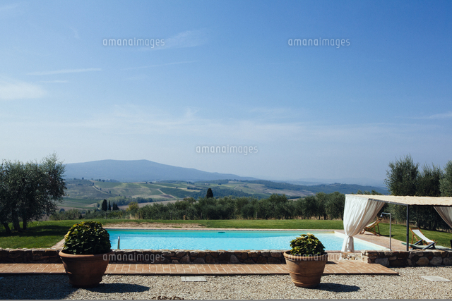 Idyllic view of swimming pool against landscape and sky[11100071674]の写真 ...