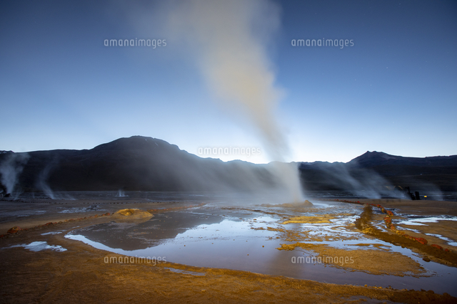 Pre-dawn light on the Geysers del Tatio (El Tatio), the third largest ...