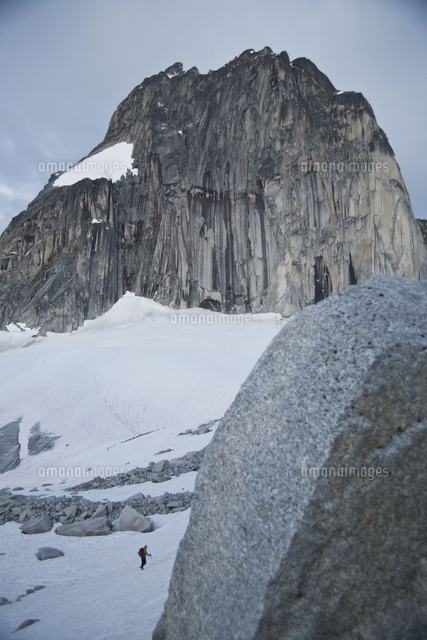 Two female climbers hike towards Bugaboo/Snowpatch Col in Bugaboo ...