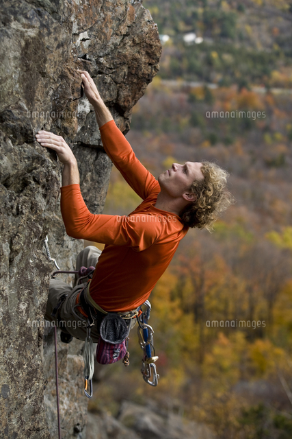 A young man climbs Lune de jour 5.9, Mt Orford, Quebec[11118015851]の写真 ...