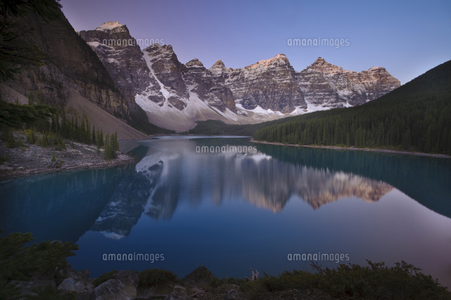Sunrise at Moraine Lake showing mountain reflections, Valley of the the ...