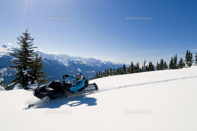 A single snowmobilier makes fresh tracks on a stunning day in the ...