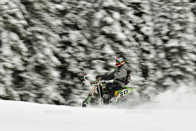 Snowcycle enthusiast in winter forest, Vernon, BC, Canada[11118030736]の ...